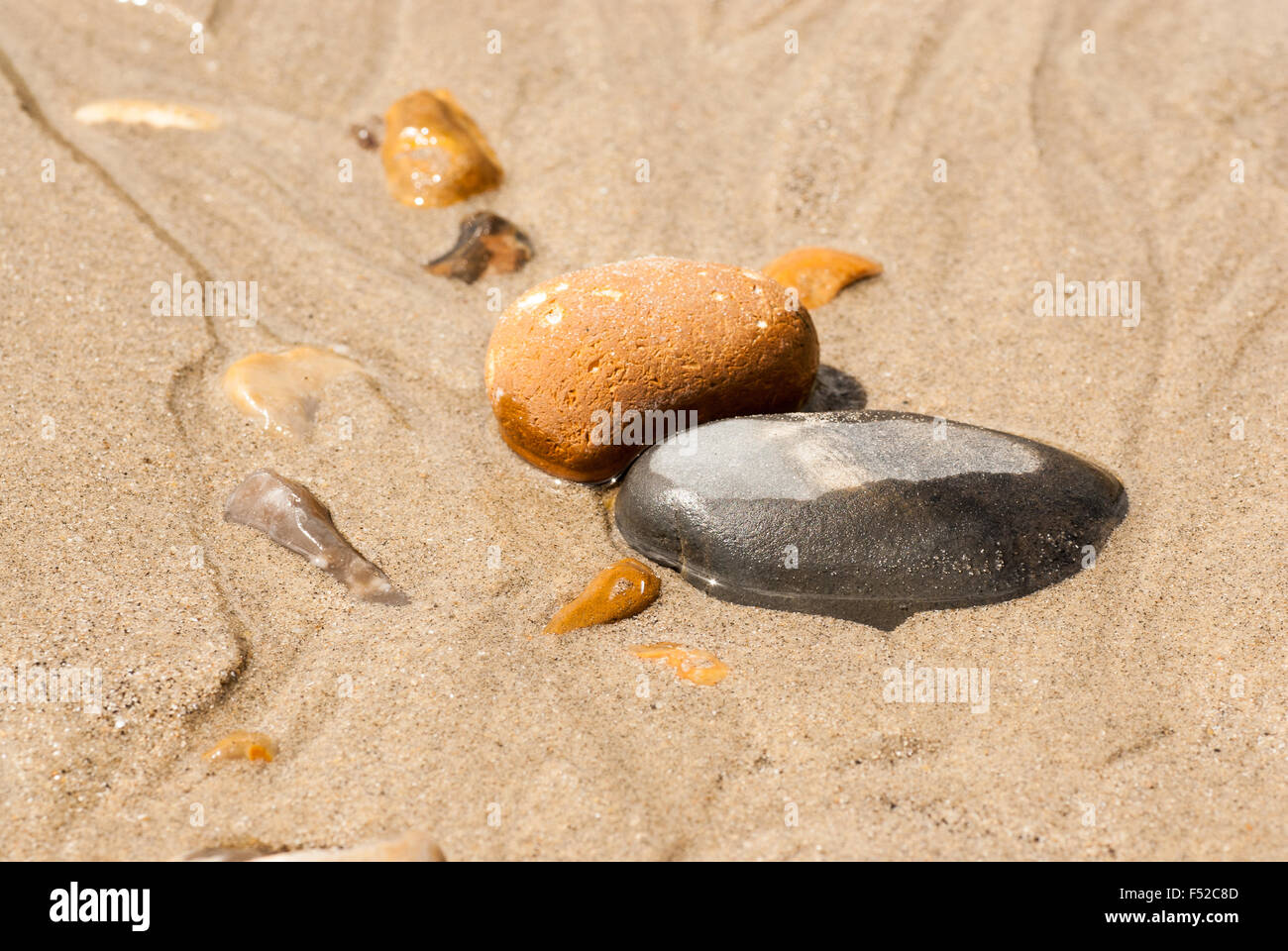 Shiny pebbles on beach hi-res stock photography and images - Alamy