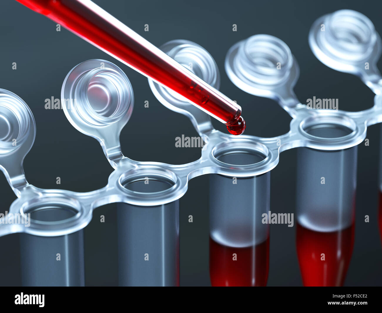 Dropping blood sample in test-tube close-up Stock Photo - Alamy