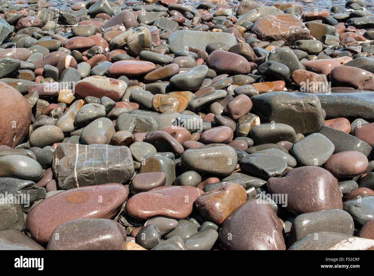 Pebbles on the Beach Background Stock Photo - Alamy