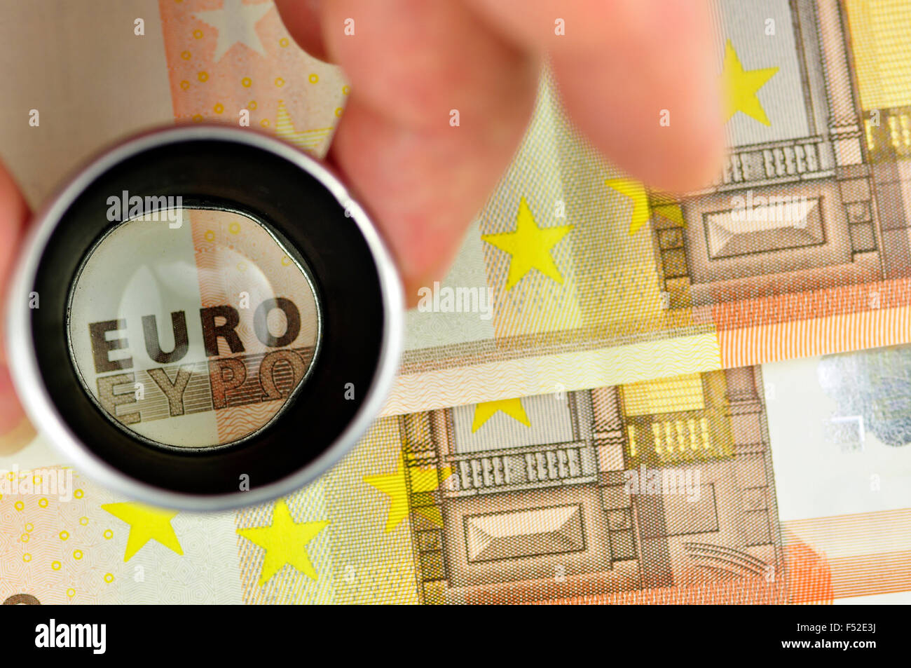 Euro Banknotes Under Magnifying Glass, Close-up Stock Photo - Alamy