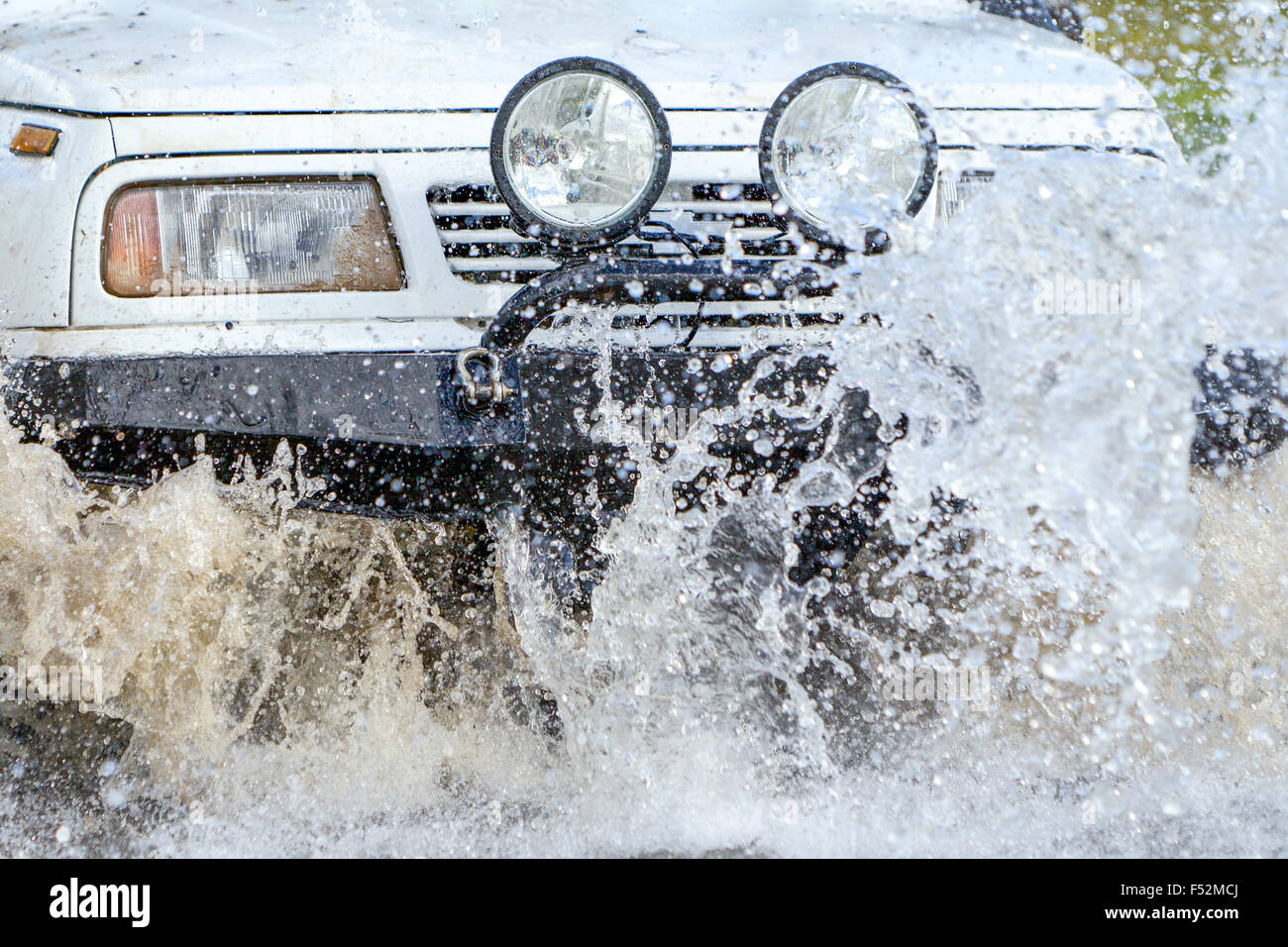 4X4 Car Off Road Driving Into The Water Stock Photo - Alamy