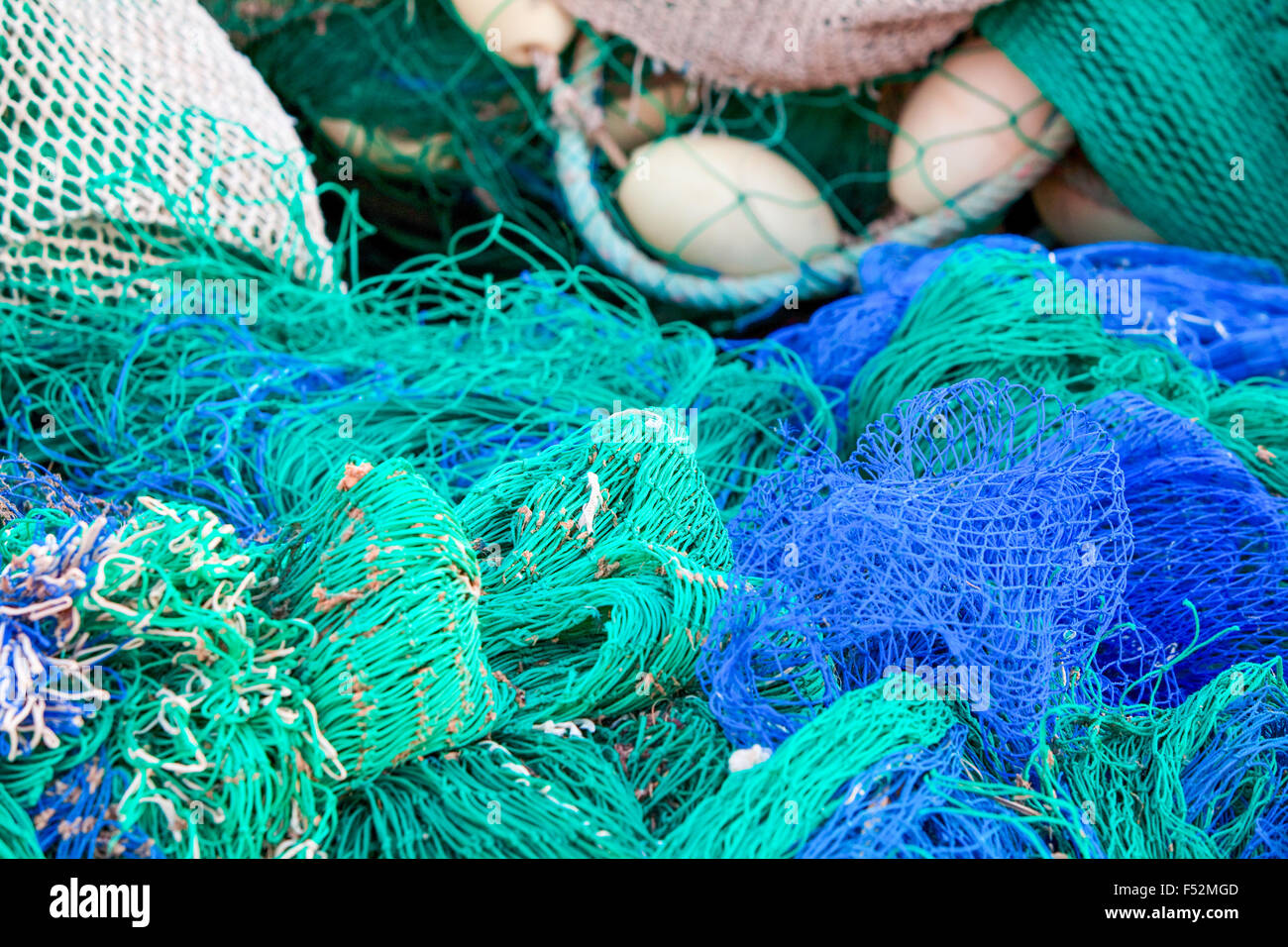 Multicolor Fishing Nests And Buoys In Harbor Area Stock Photo - Alamy