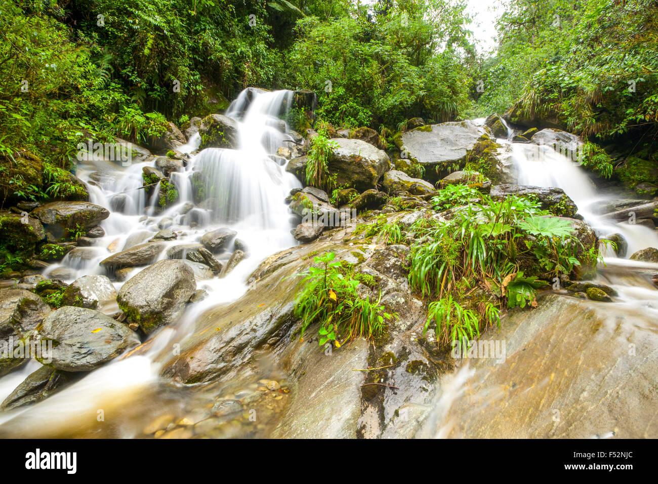 Waterfall In Machay Mountain Close To Banos Ecuador Stock Photo - Alamy
