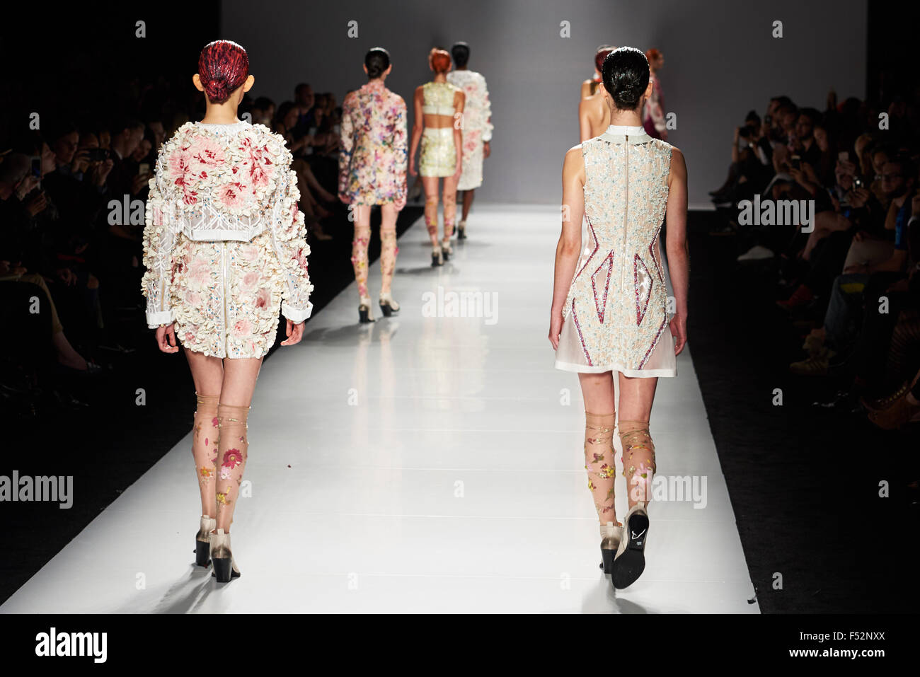 Model walking on the runway showcasing design of Mikhael Kale during ...