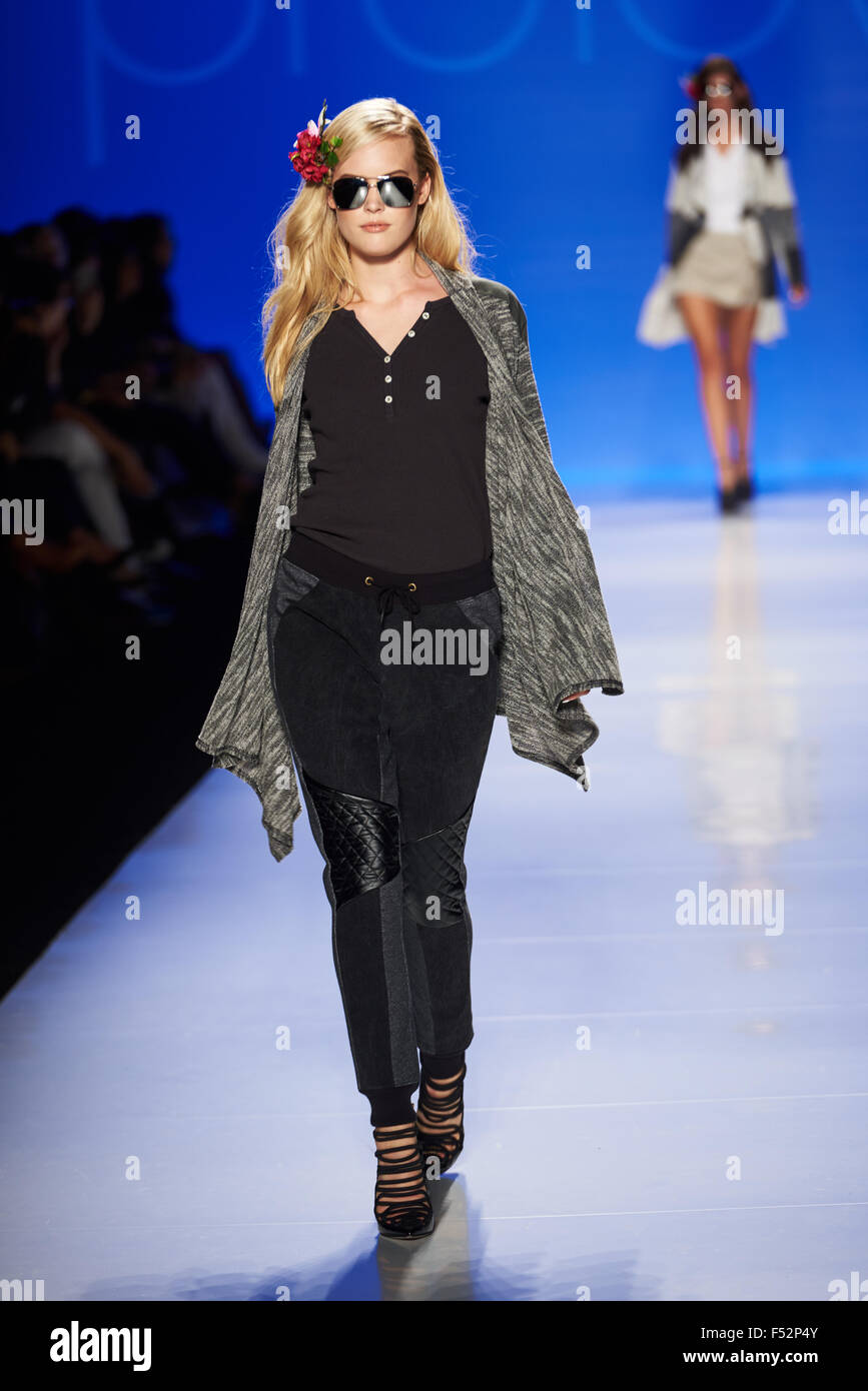 Model walking on the runway showcasing design of Preloved during ...