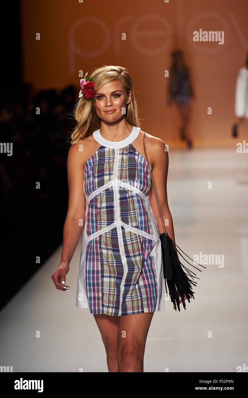 Model walking on the runway showcasing design of Preloved during ...