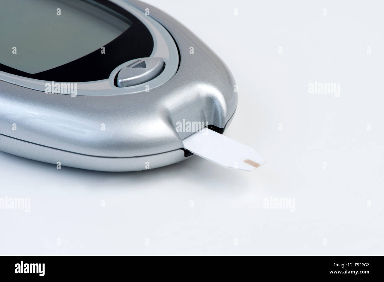 Close-up of blood sugar glucometer and testing strip Stock Photo - Alamy