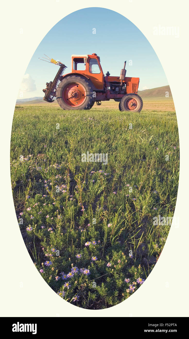Side view of a tractor in a scenic view Stock Photo - Alamy