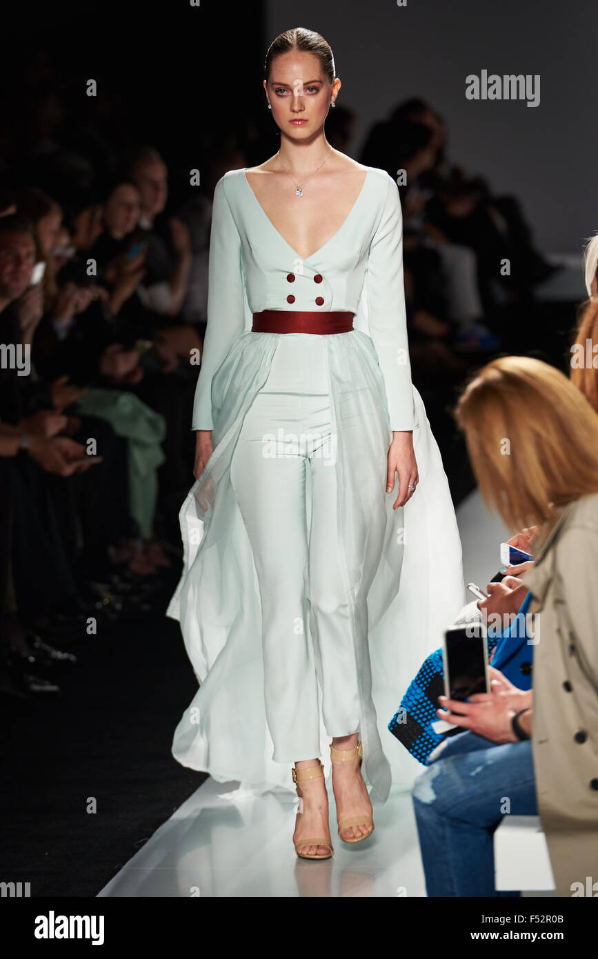 Model walking on the runway showcasing design of Matthew Gallagher ...