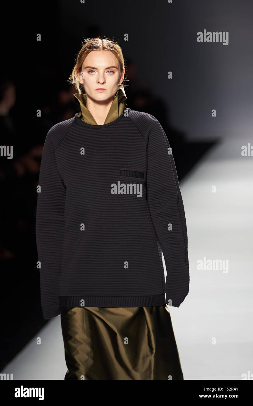 Model walking on the runway showcasing design of SID NEIGUM during ...