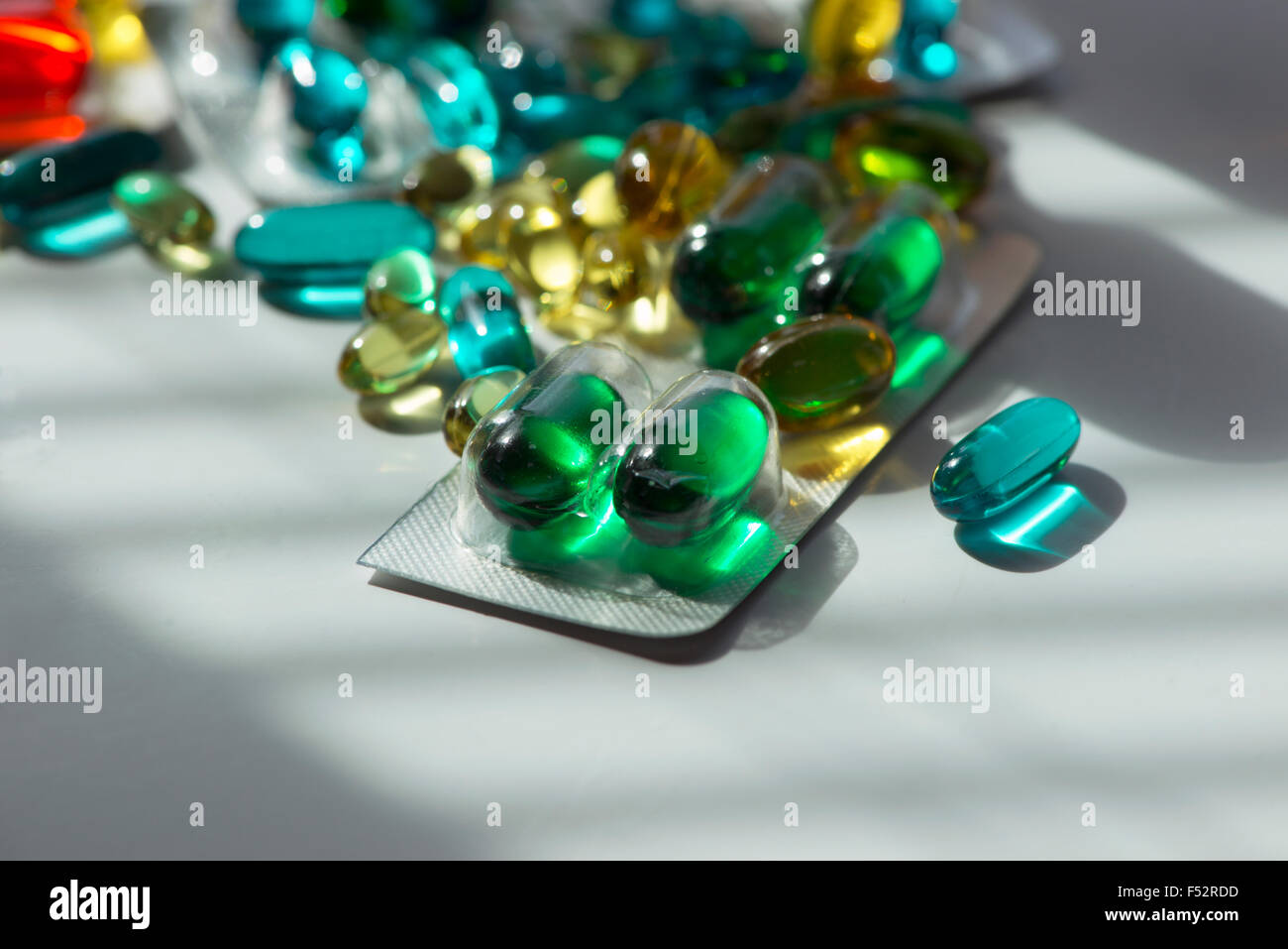 Multi colored capsule hi-res stock photography and images - Alamy