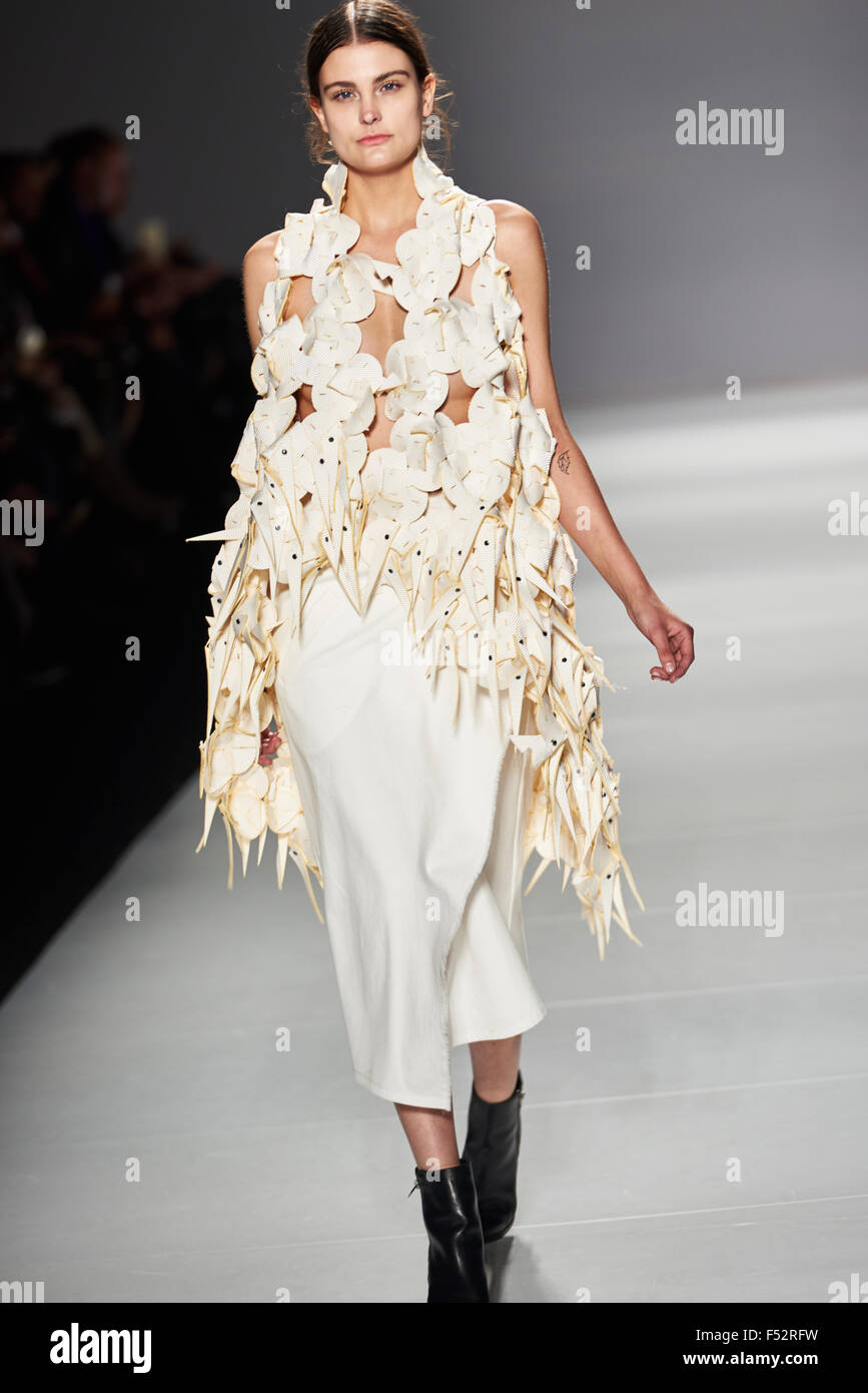 Model walking on the runway showcasing design of SID NEIGUM during ...