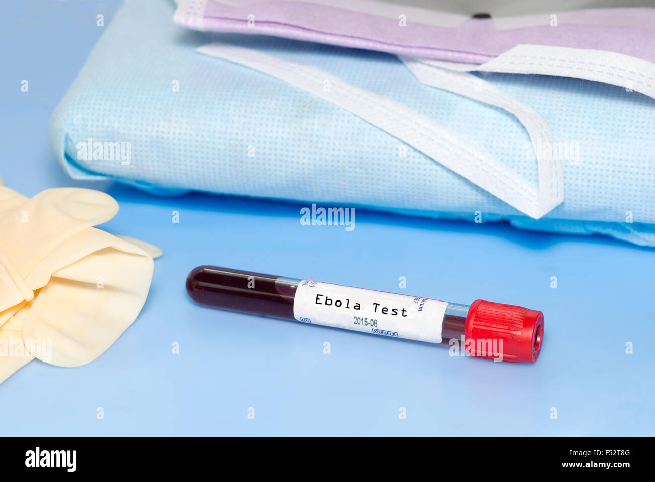 Blood collection tube with Ebola test label and personal protection ...