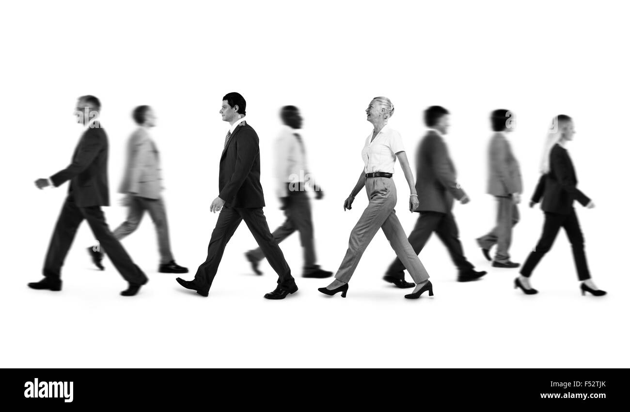 Diverse group business people walking Black and White Stock Photos ...