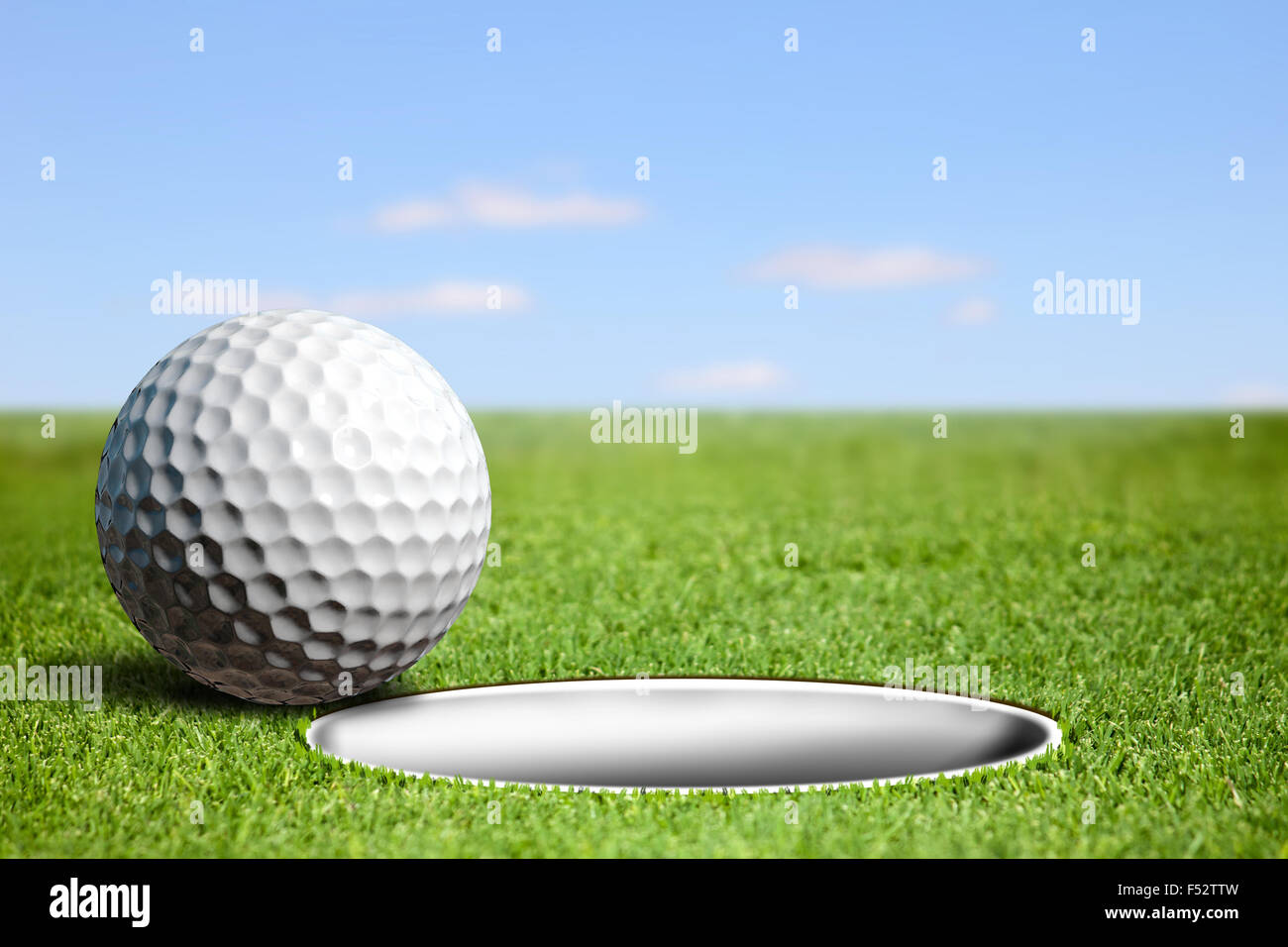 Abstract illustration golf ball at the hole Stock Photo - Alamy