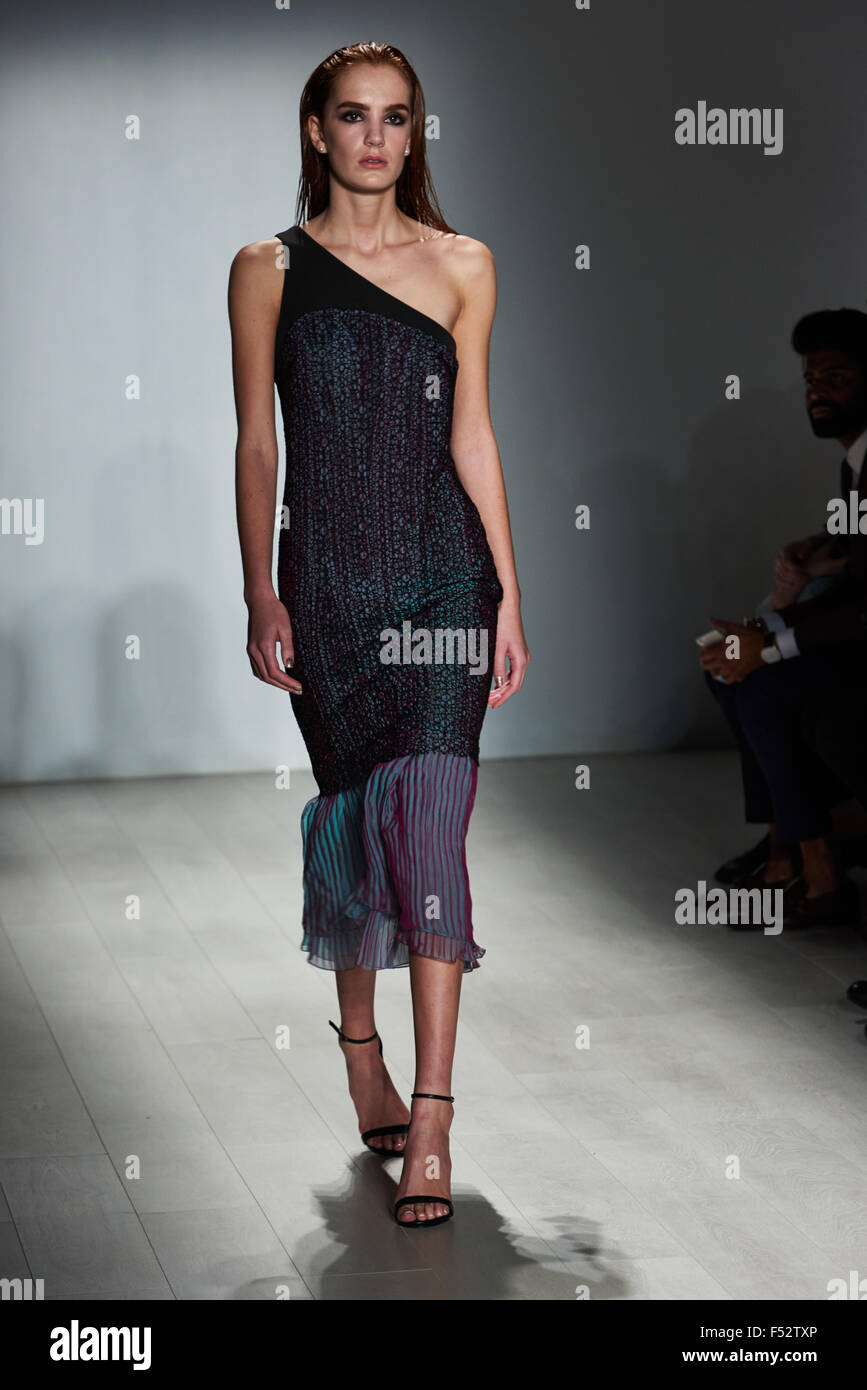 Model walking on the runway showcasing design of HELDER DIEGO during ...