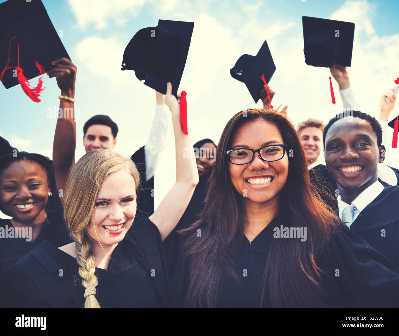 Group of Diverse Students Celebrating Graduation Concept Stock Photo ...