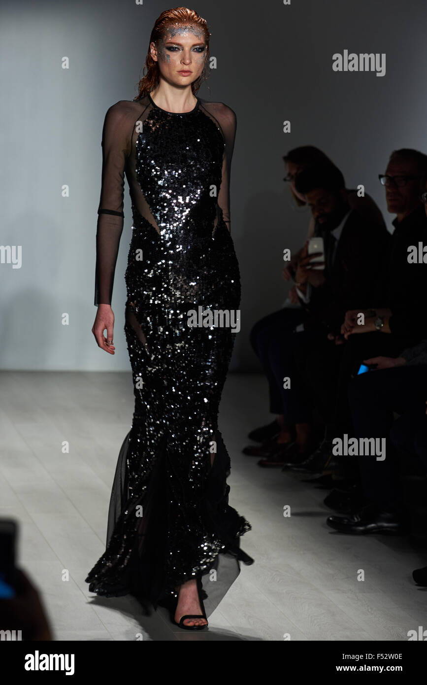 Model walking on the runway showcasing design of HELDER DIEGO during ...