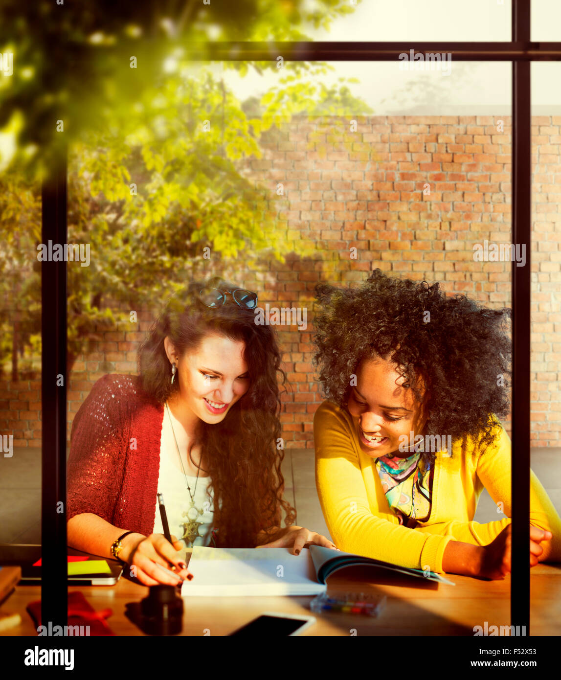 Ladies Women Working Together Project Concept Stock Photo - Alamy