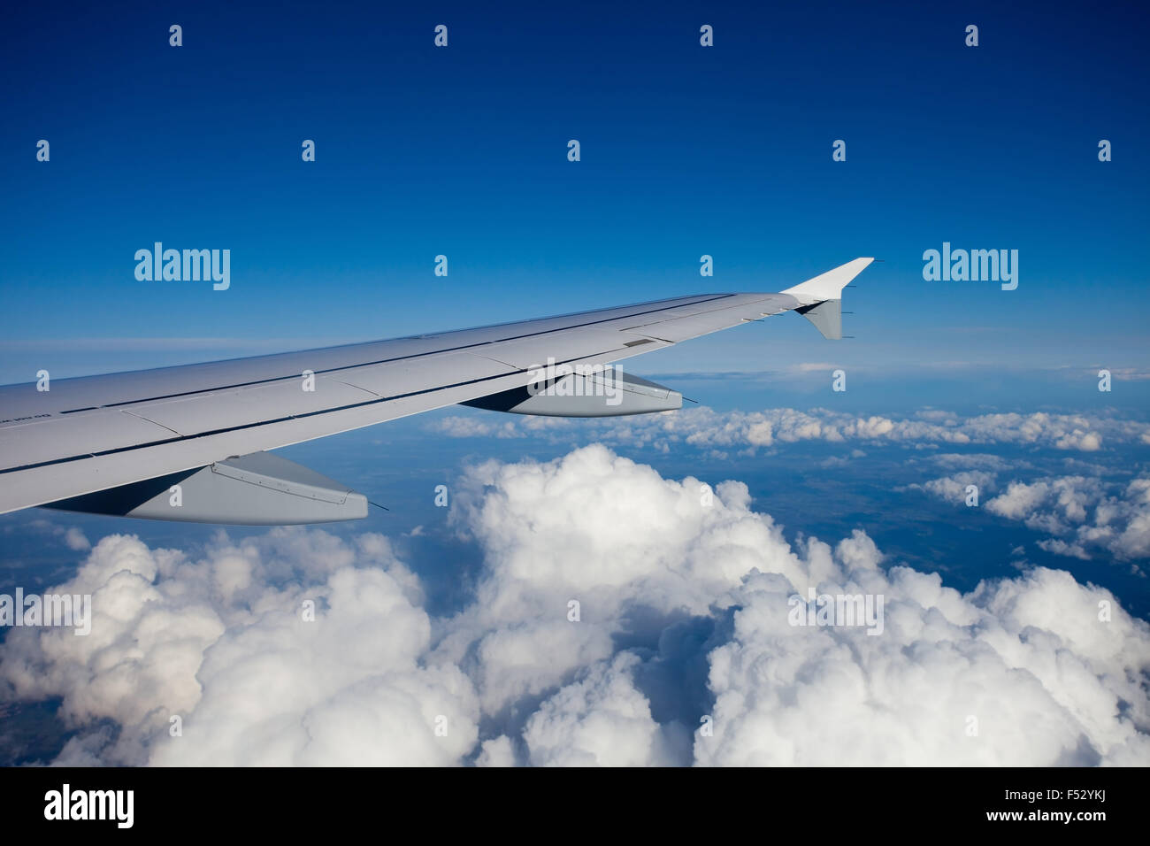 Wing, airplane, clouds, blue sky, lift of, aviation Stock Photo - Alamy