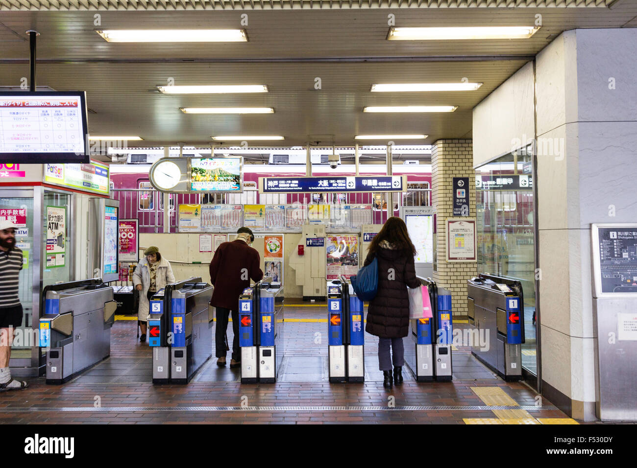 Japan, Nishinomiya, Shukugawa. Entrance and ticket barriers to the ...