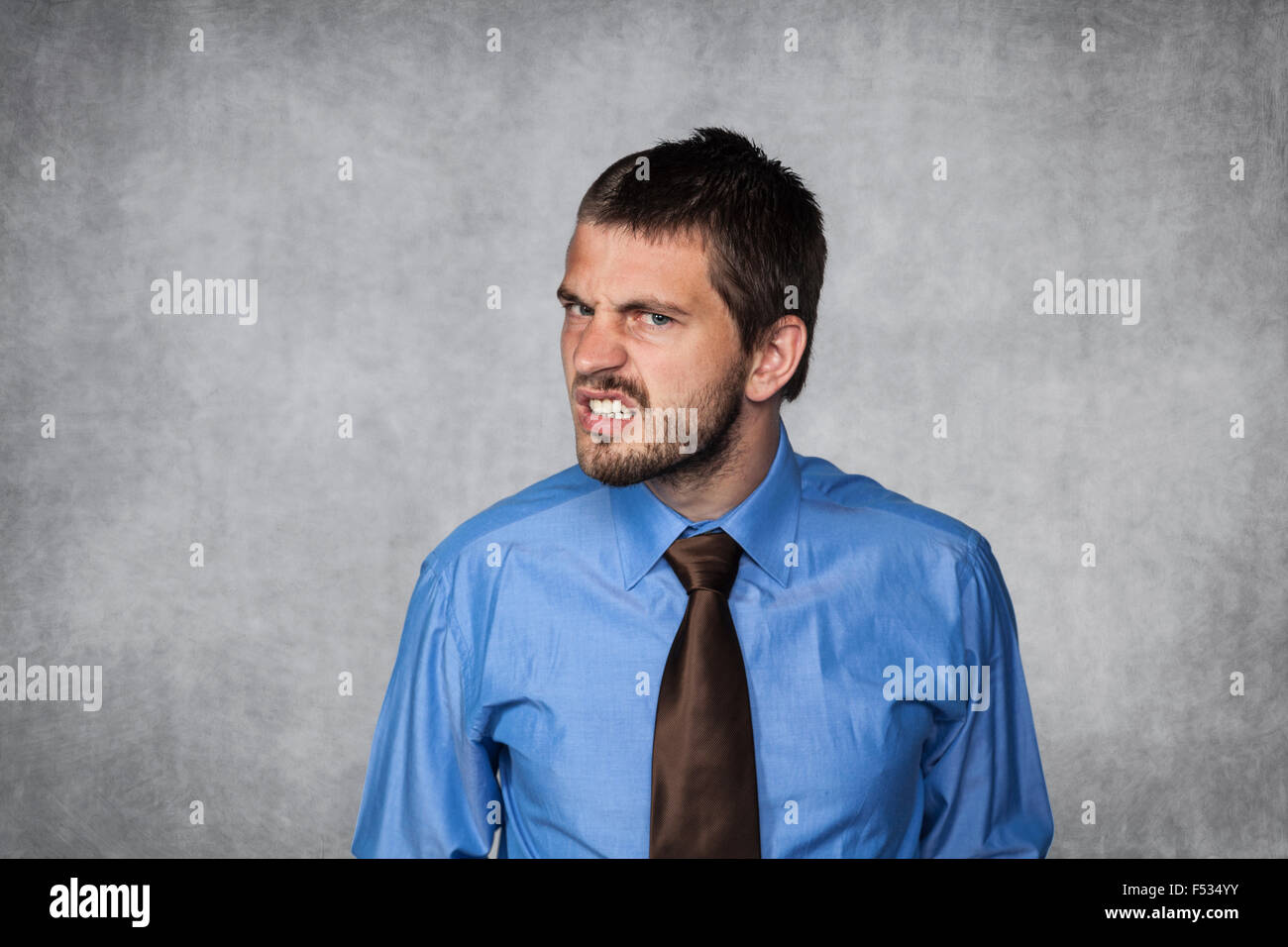 face of evil businessman Stock Photo - Alamy