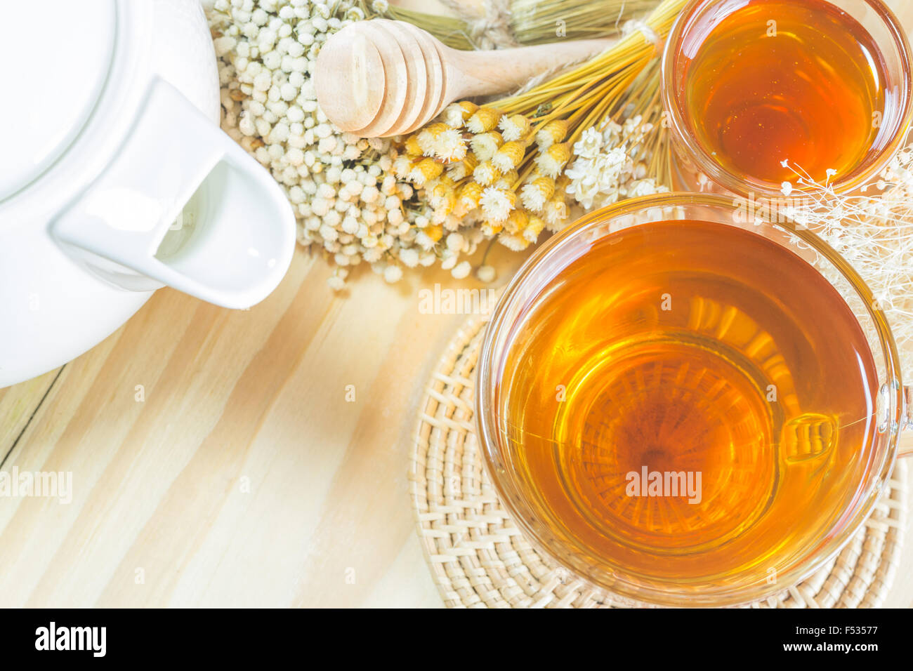 tea with honey and teapot on wood background,warm toning, selective focus Stock Photo - Alamy