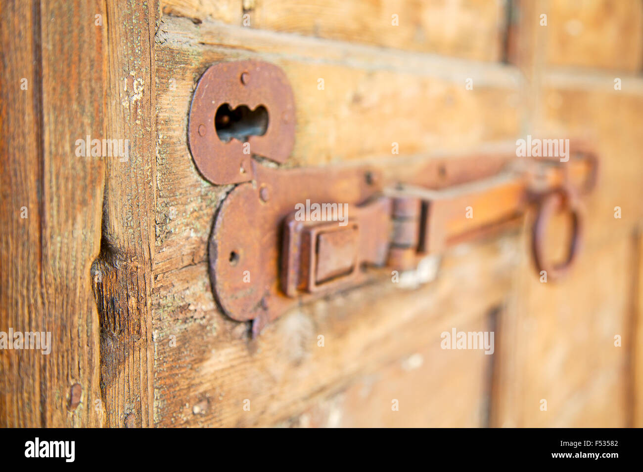 europe old in italy antique close brown door and rusty lock closeup ...