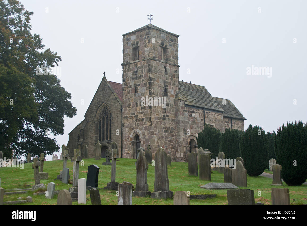 Graveyard and church tower hi-res stock photography and images - Alamy