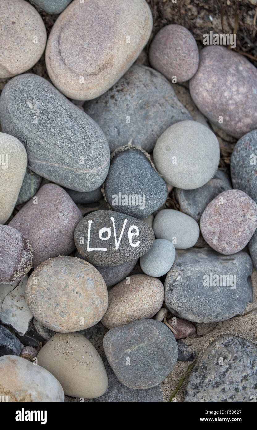 stones, pebble stone with stroke 'Love' Stock Photo - Alamy