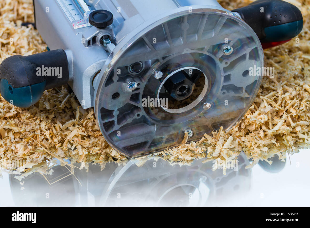 variable speed plunge router on sawdust background Stock Photo - Alamy