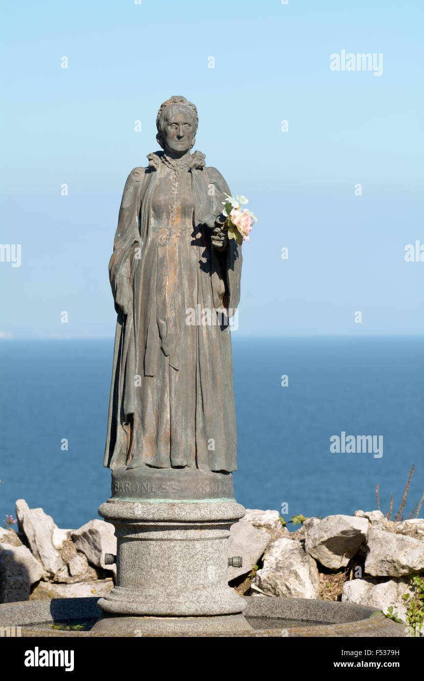 The Lady Mount Temple bronze statue holding flowers in her hand at ...