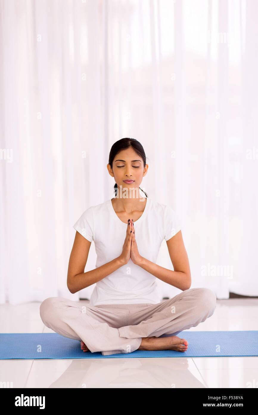 Indian person meditating hi-res stock photography and images - Alamy