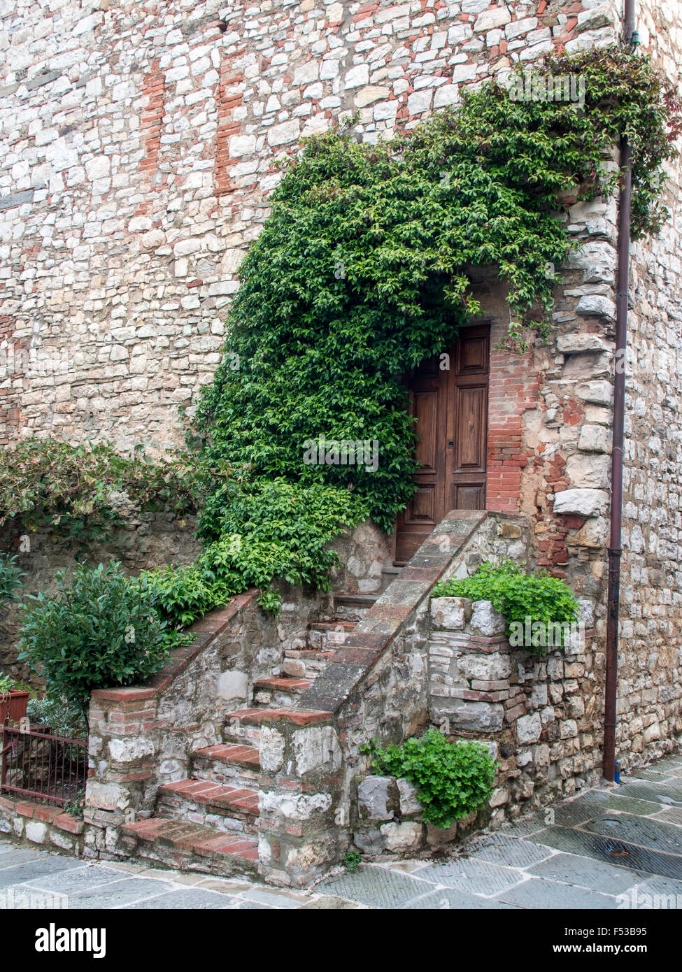 Europe, Italy, Tuscany. Exploring the small hillside town of Vertine in ...