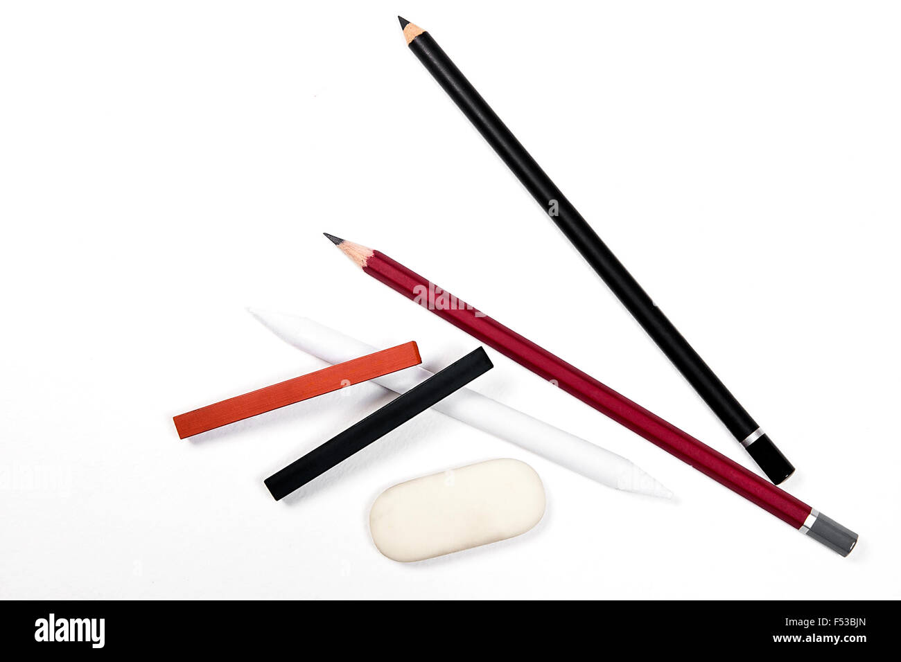 Assorted Art Tools. Pencils, eraser, stamp, chalk of sanguine and ...