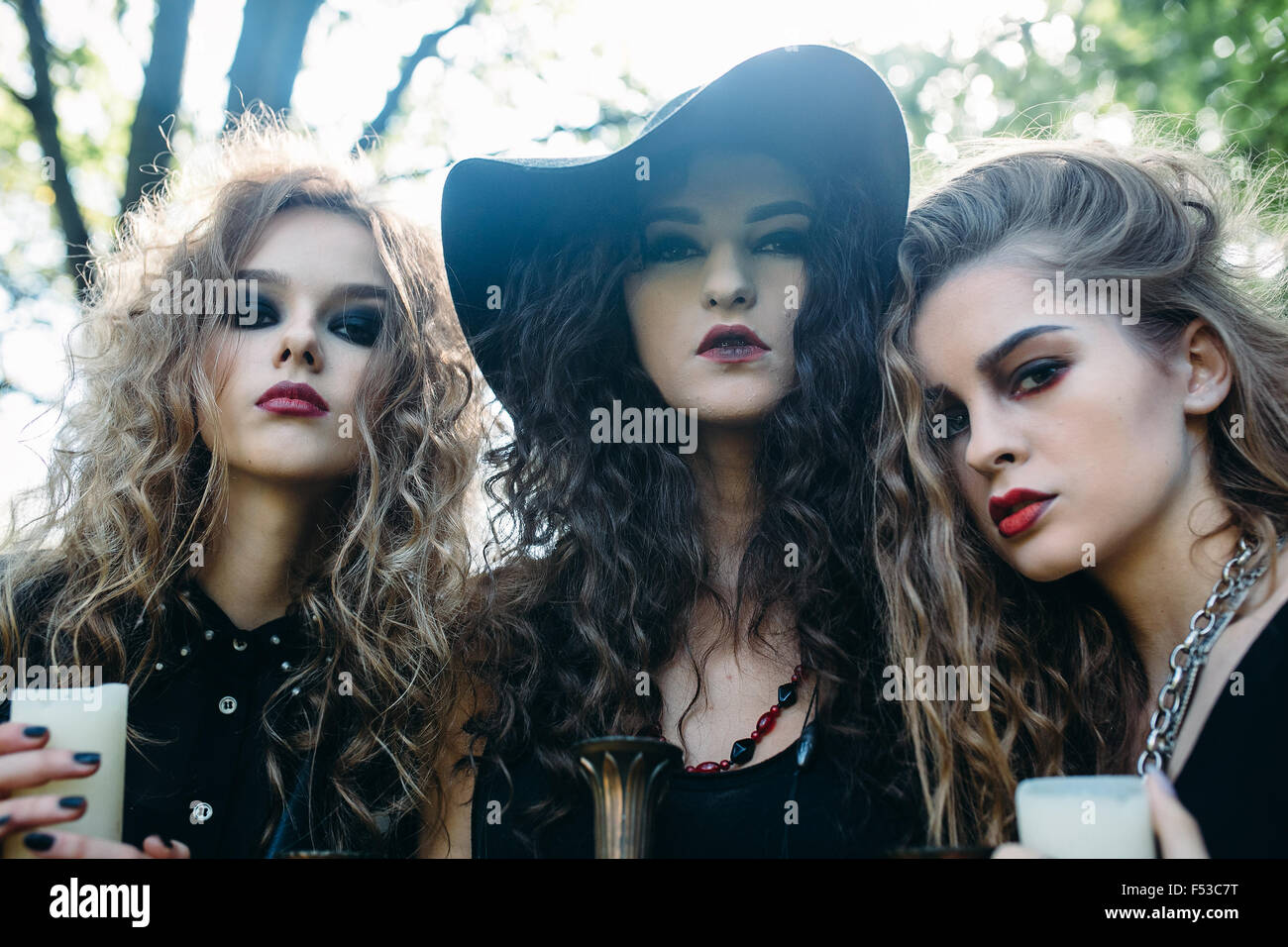 three vintage women as witches Stock Photo - Alamy