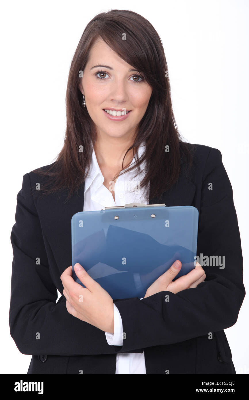 Young woman with notepad on white background Stock Photo - Alamy
