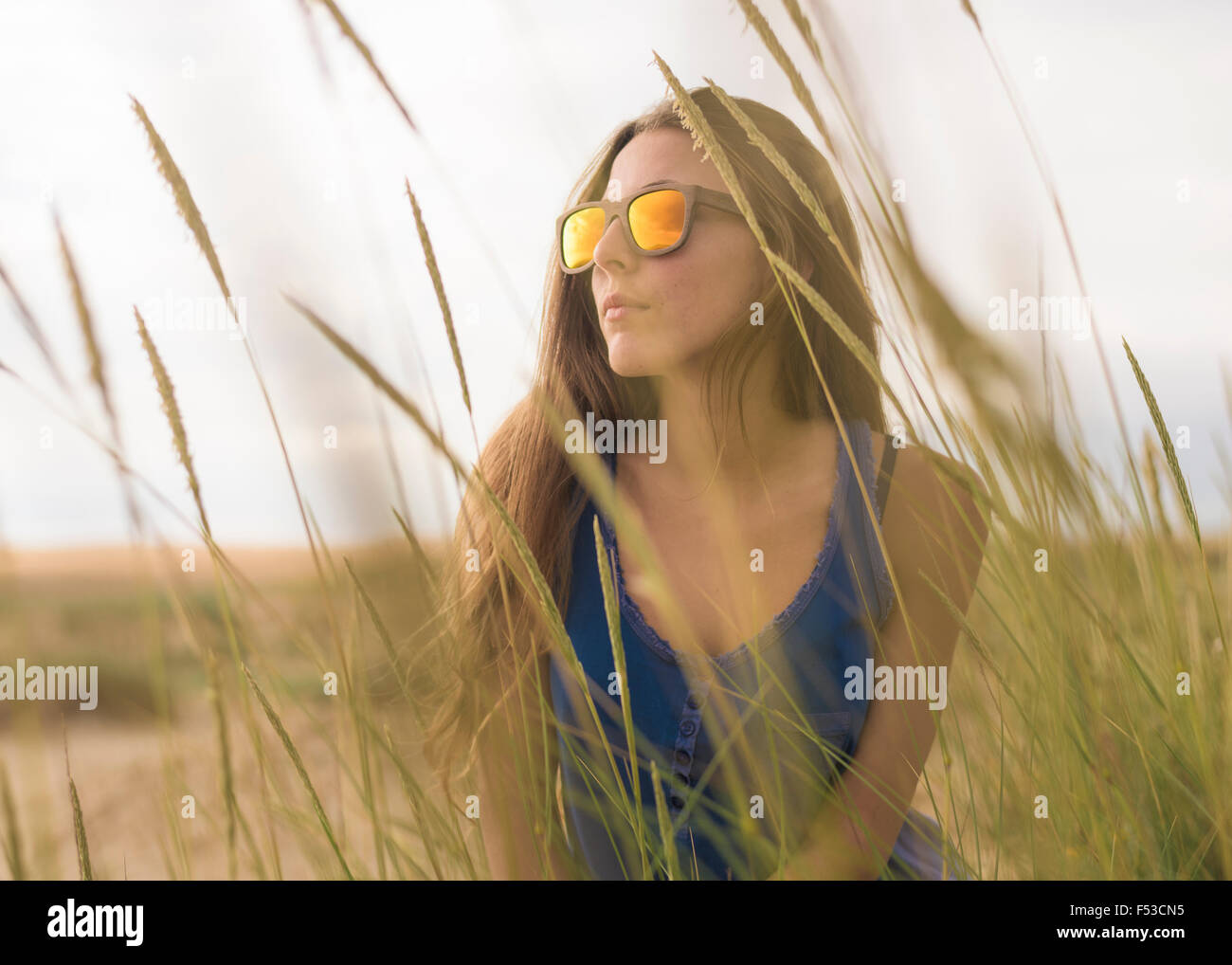 Young woman feeling blue Stock Photo - Alamy
