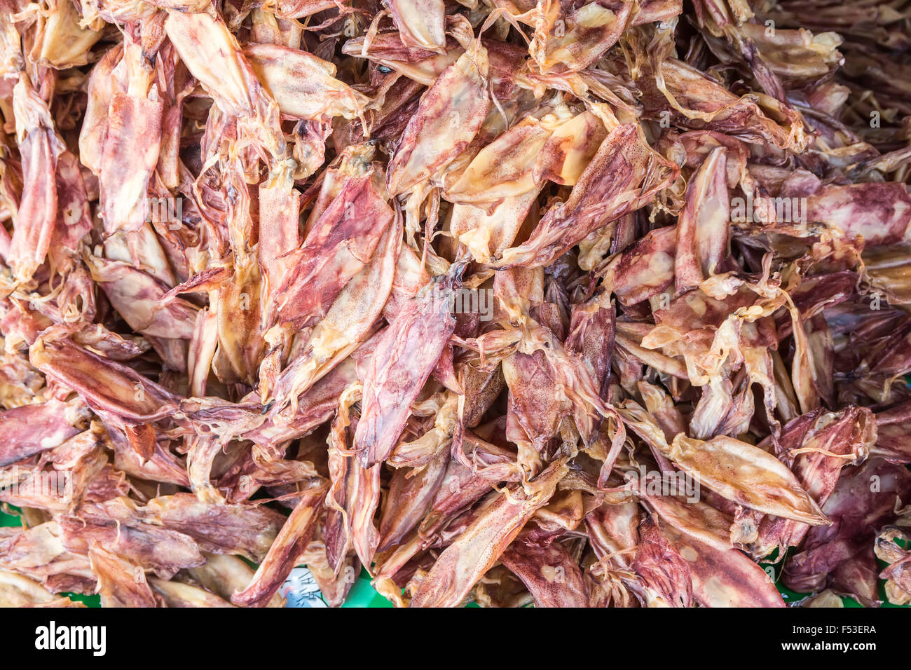 Dried squid are the food of the fishermen Stock Photo - Alamy