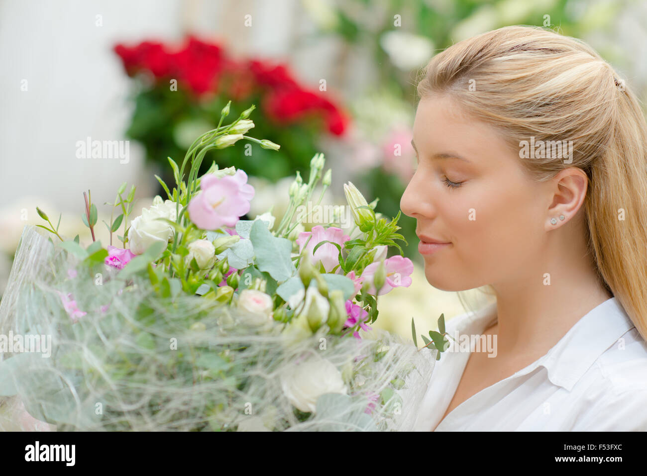 Florist selling flowers Stock Photo - Alamy