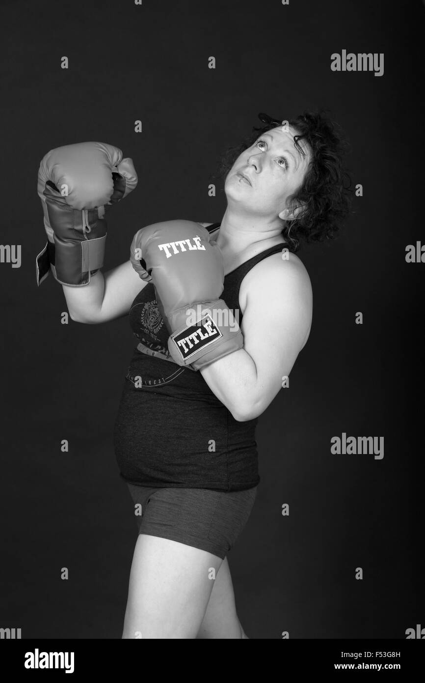 Thirty's woman boxer posing in the photo studio, September 2015 Stock ...