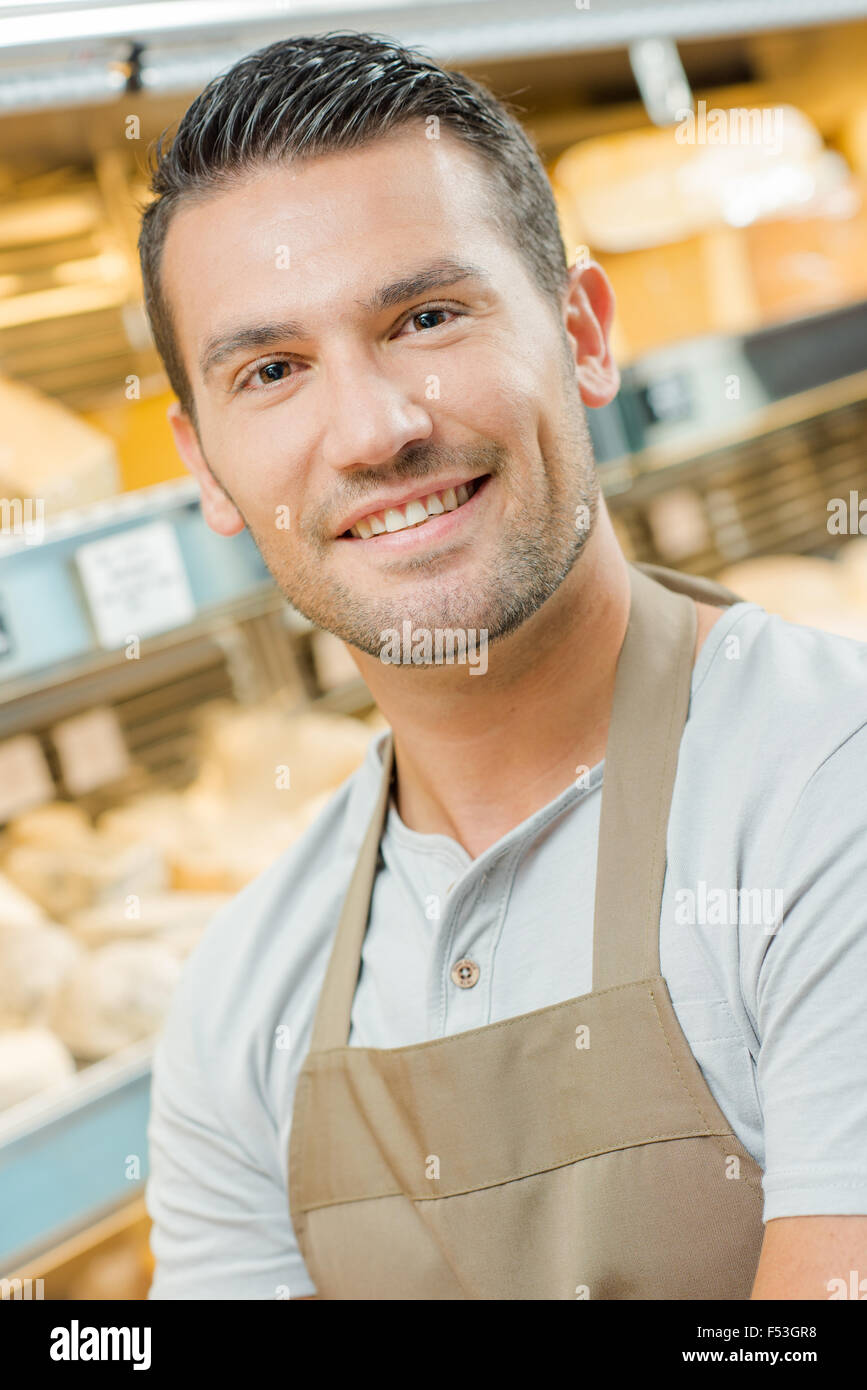 Man stood in his bakery Stock Photo - Alamy