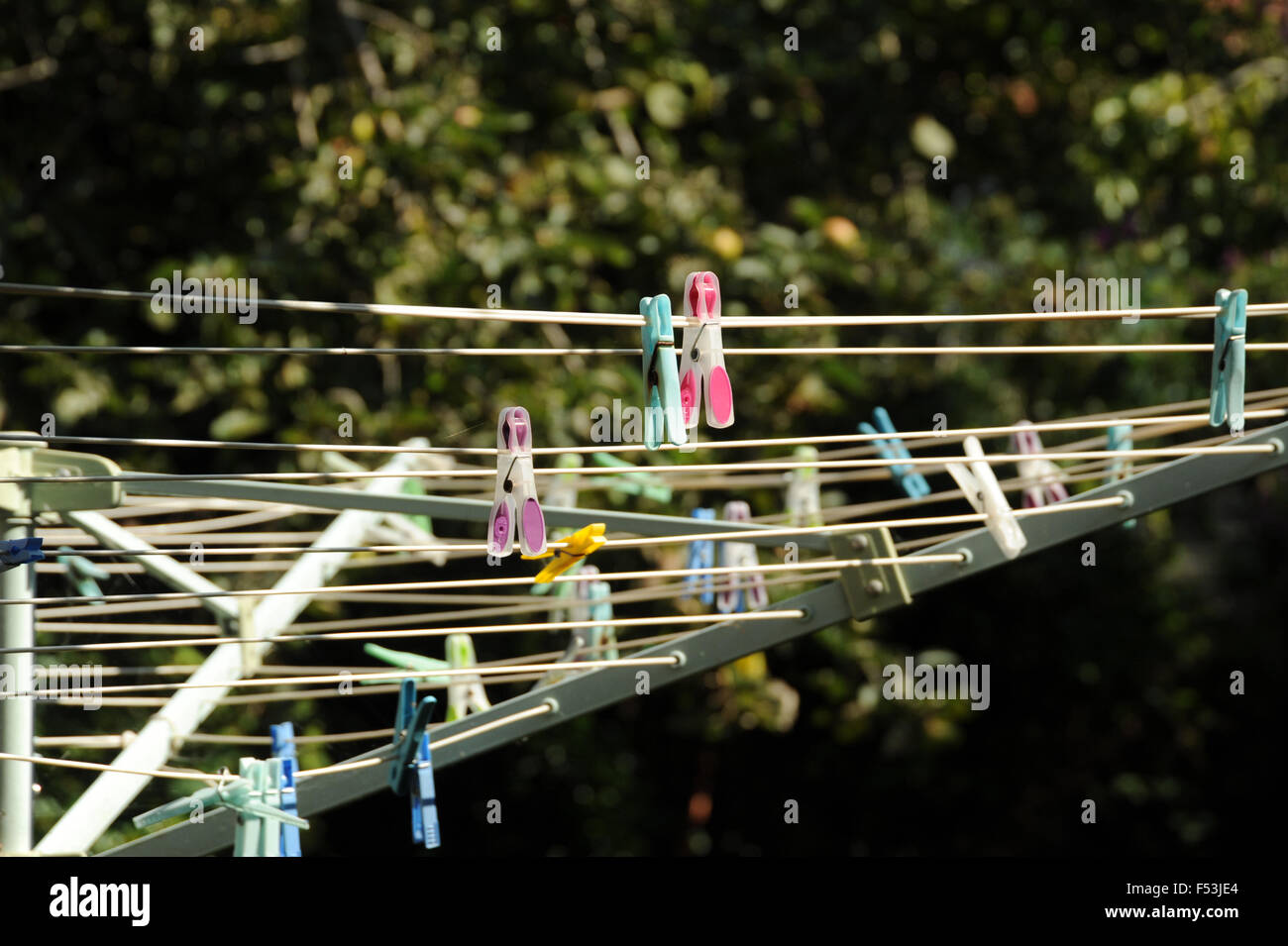 Clothes pegs on washing line Stock Photo - Alamy