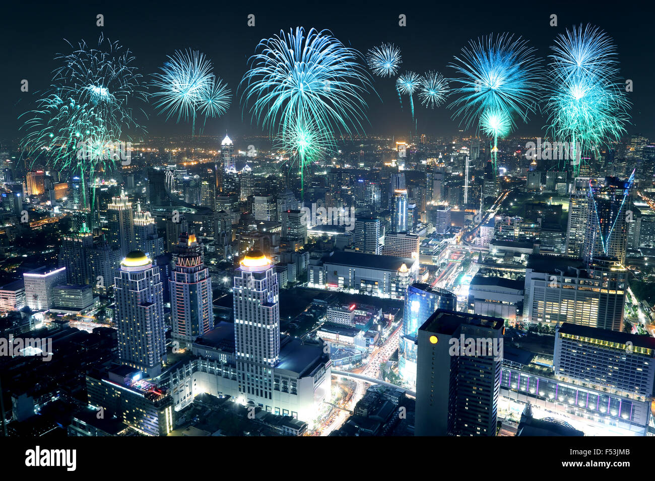 Fireworks celebrating over Bangkok cityscape at night, Thailand Stock ...