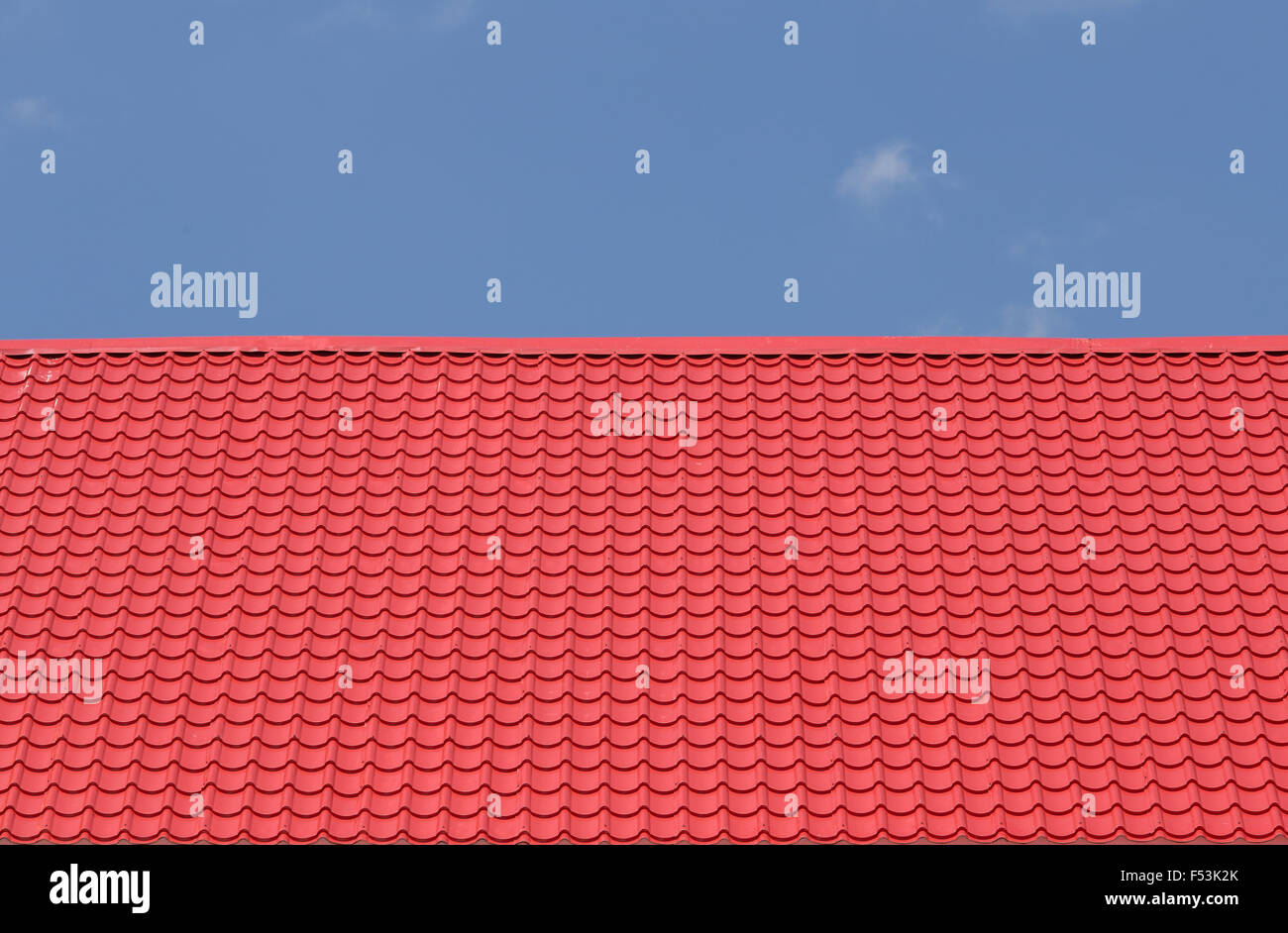 texture of red roof with blue sky Stock Photo - Alamy