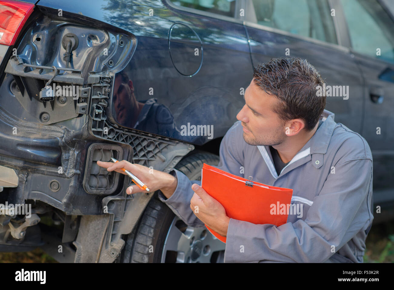 Assessing damage hi-res stock photography and images - Alamy