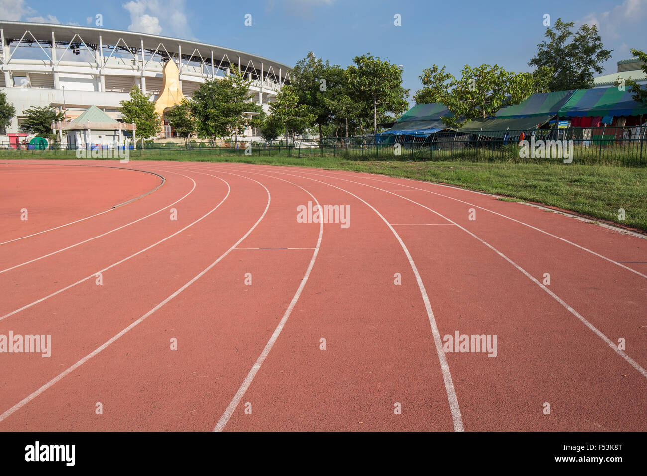 empty outdoor racetrack with blue sky Stock Photo - Alamy