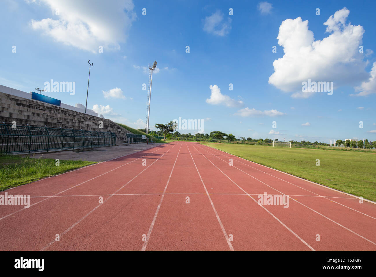empty outdoor racetrack with blue sky Stock Photo - Alamy