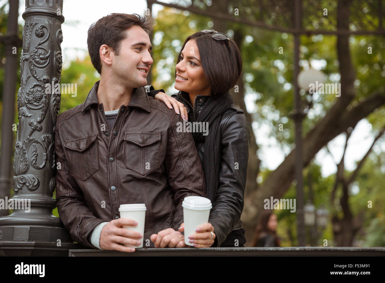 Romantic couple flirting outdoors hi-res stock photography and images ...