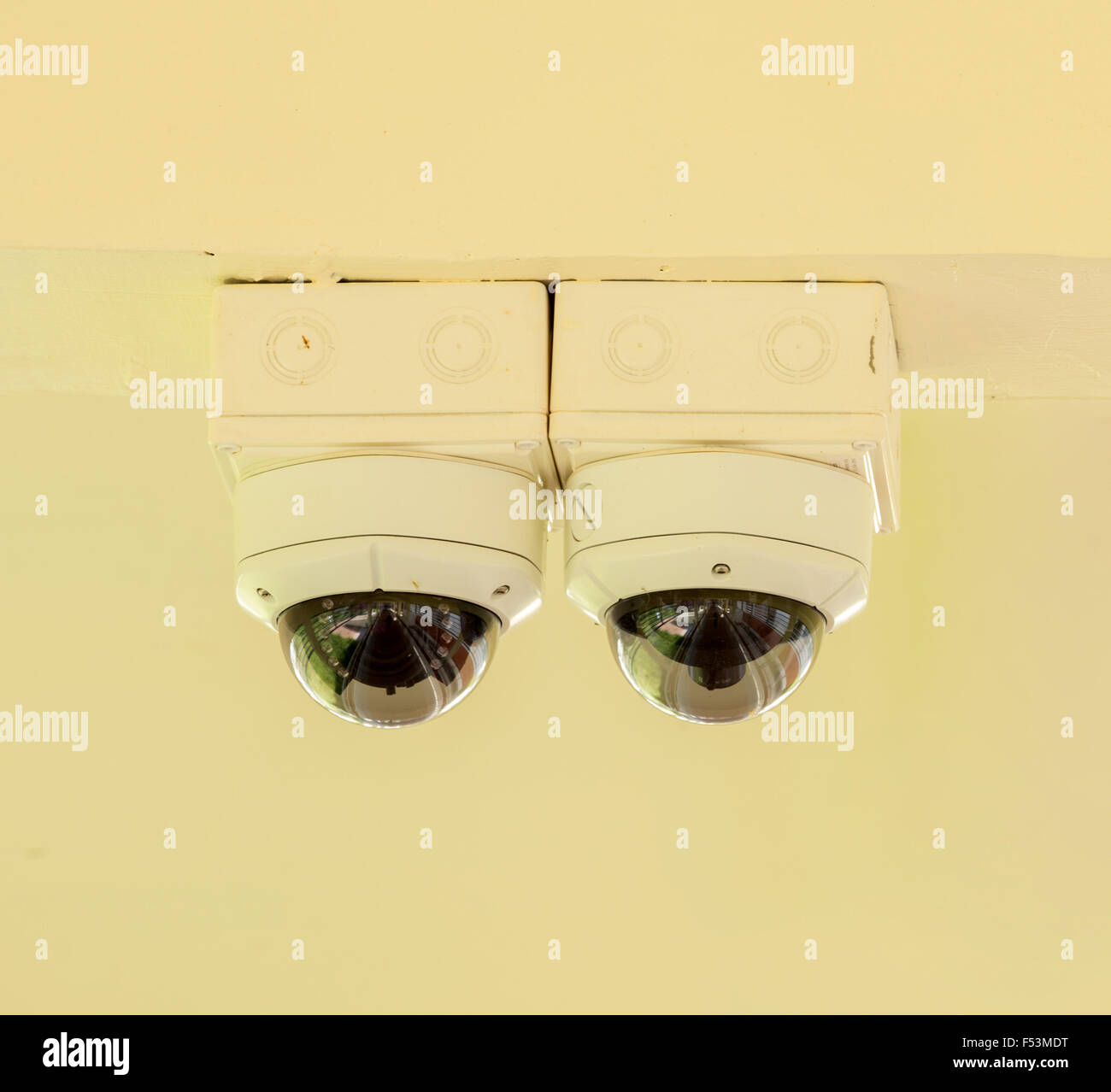 CCTV Security camera wall ceiling Stock Photo - Alamy